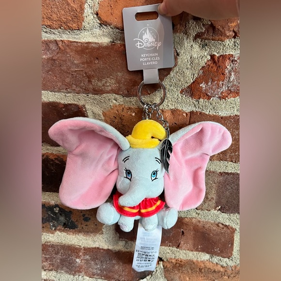 Disney | Accessories | Disney Parks Dumbo Plush Keychain With Feather ...